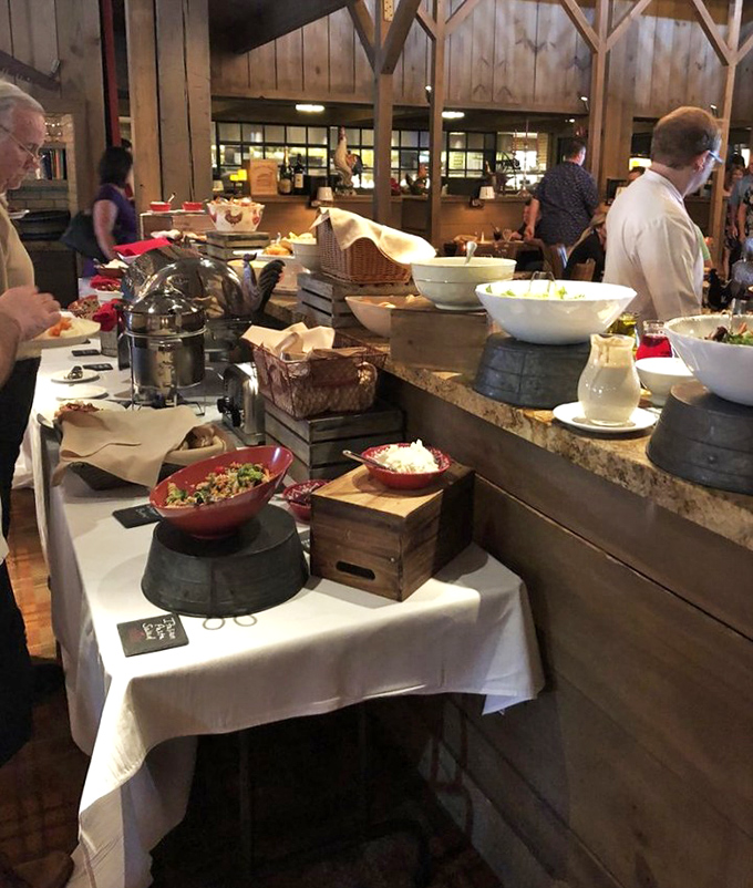 The buffet spread that proves Ohio knows how to do abundance with style—rustic vessels elevating comfort food to art form status.