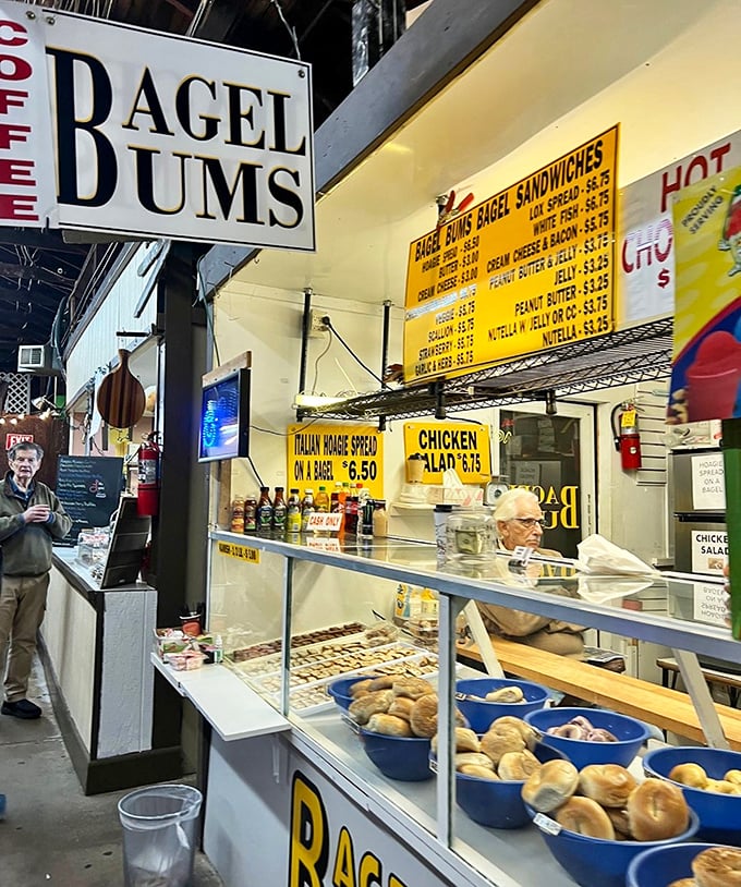 "Bagel Bums" isn't just a clever name—it's a promise of carb-loaded happiness. The display case is a museum of circular delights.