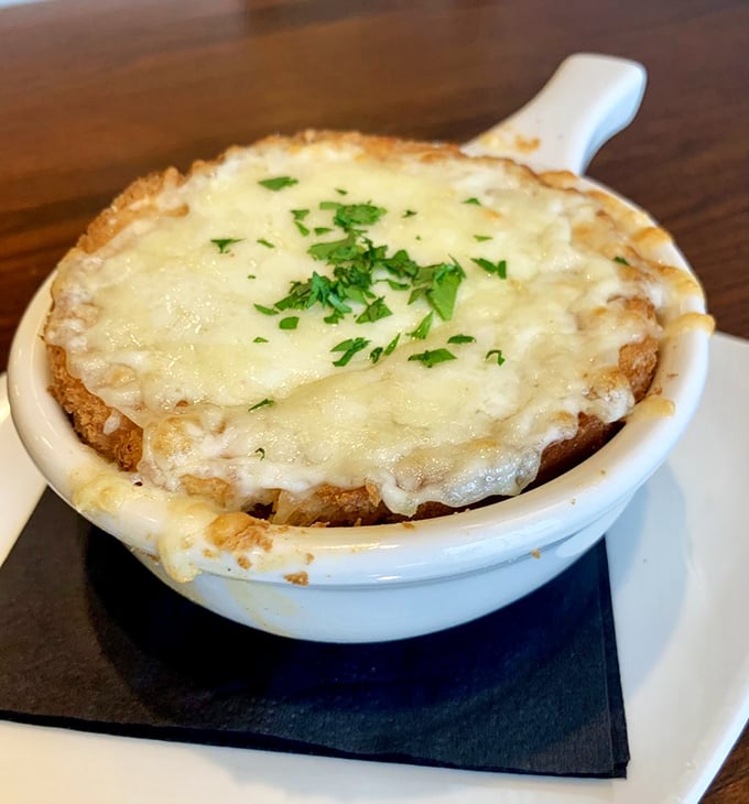 French onion soup that's had a makeover—the cheese pull potential here could win Olympic medals for both distance and style.