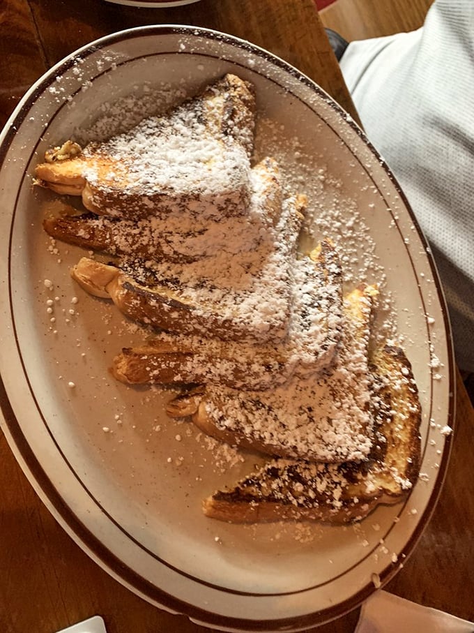 French toast dusted with powdered sugar, because sometimes breakfast deserves to feel like dessert without the guilt.