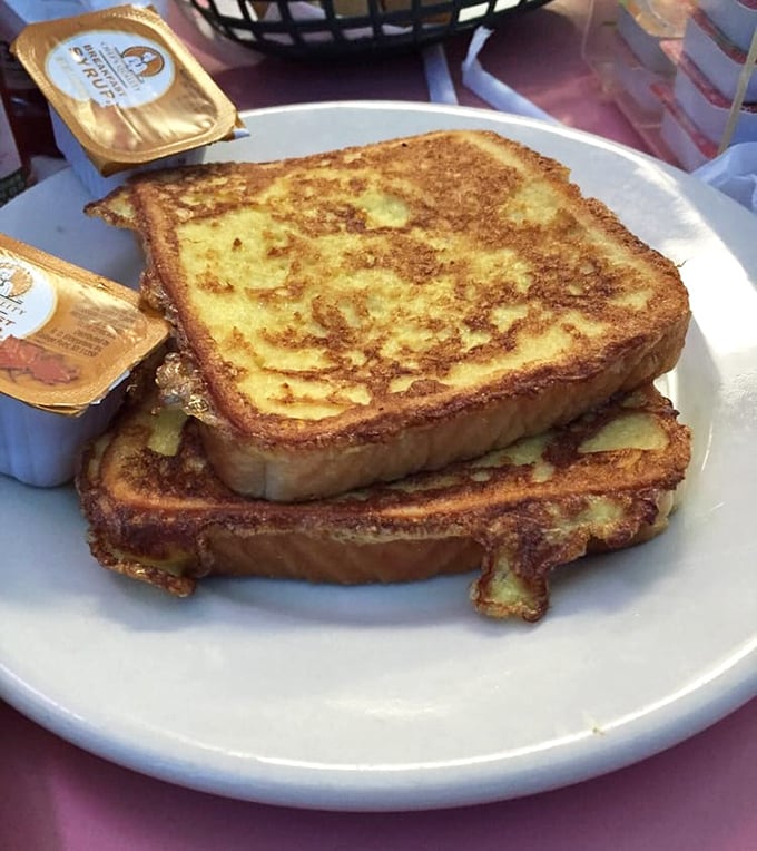 French toast that's achieved that mythical balance—crispy edges, custardy center, and enough structural integrity to support a proper maple syrup dousing.
