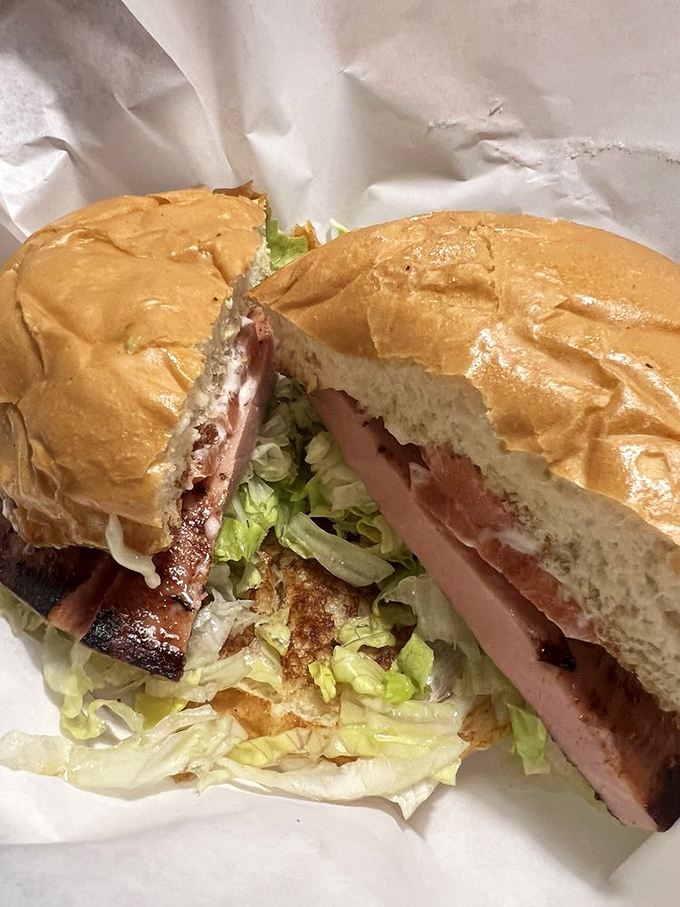 The fried bologna sandwich—a nostalgic throwback that tastes like your best childhood lunch got a PhD in deliciousness.