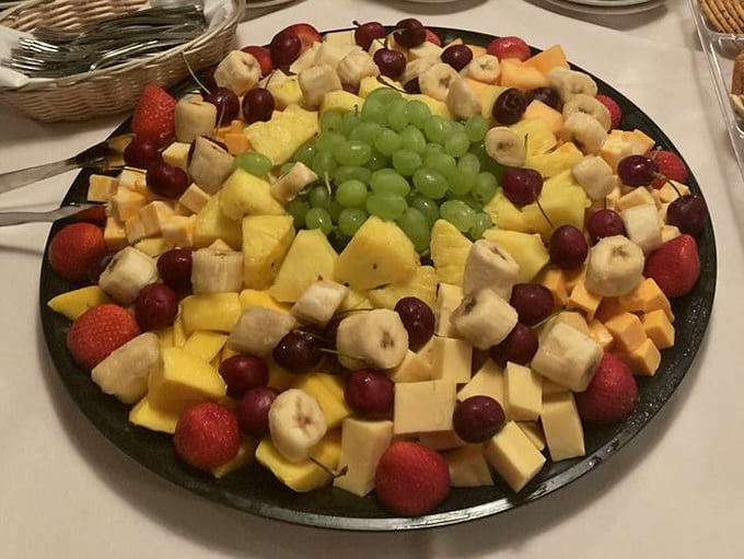 A fruit platter that proves sometimes the simplest pleasures – fresh, colorful, and artfully arranged – are the perfect finale to a magnificent meal.