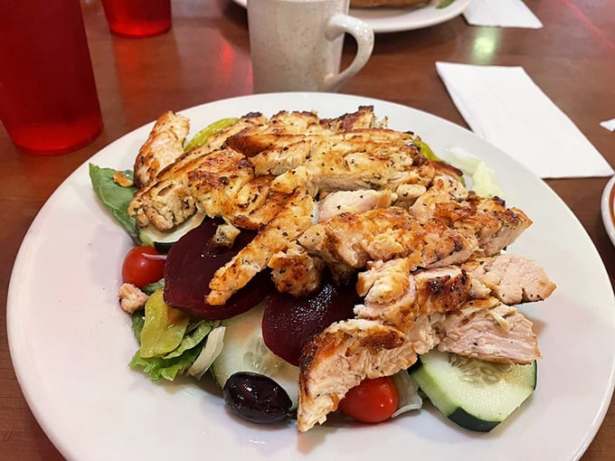 A grilled chicken salad that doesn't apologize for being healthy – vibrant, fresh, and substantial enough to satisfy even dedicated carnivores.