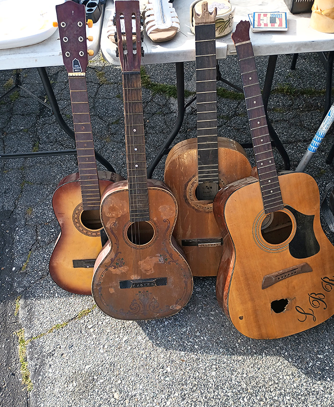 Guitar graveyard or musician's paradise? These well-loved instruments have stories in every scratch and dent—just waiting for new fingers to play them.