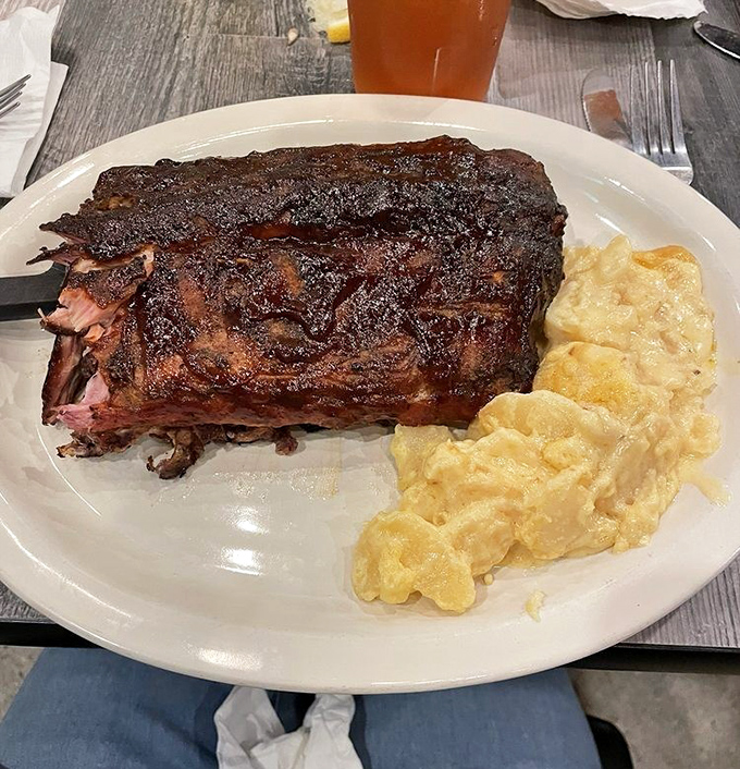 Fall-off-the-bone ribs paired with creamy mac and cheese—the kind of plate that makes conversation stop and appreciative noises begin.