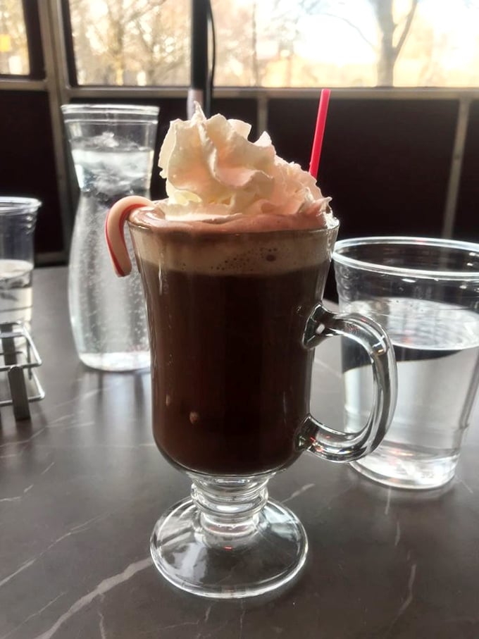 When Chicago winters bite, this hot chocolate bites back – topped with a cloud of whipped cream and a candy cane for good measure.