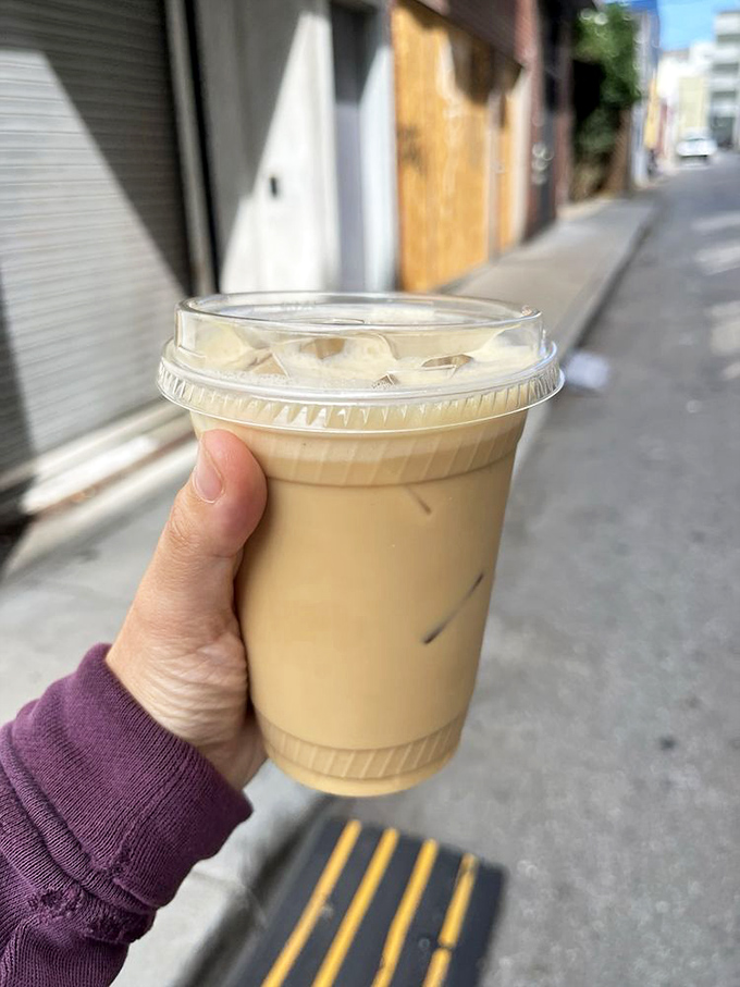 The sidewalk coffee experience—urban tranquility in a cup. There's something poetic about sipping exceptional coffee while watching the city move around you.