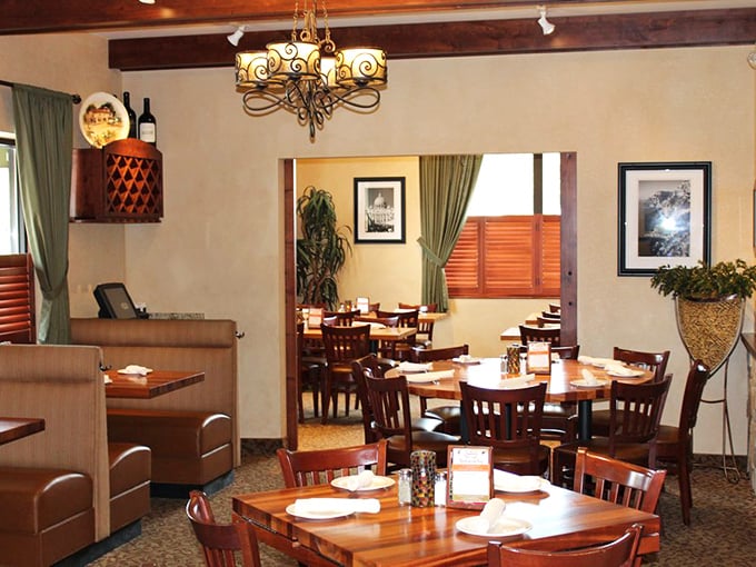 Wooden beams overhead, comfortable booths, and tables arranged for conversation—because good Italian food demands equally good company.