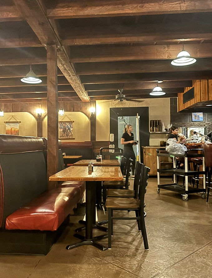 The dining room feels like it was designed by someone who actually eats in restaurants – comfortable, unpretentious, and ready for the serious business of enjoyment.