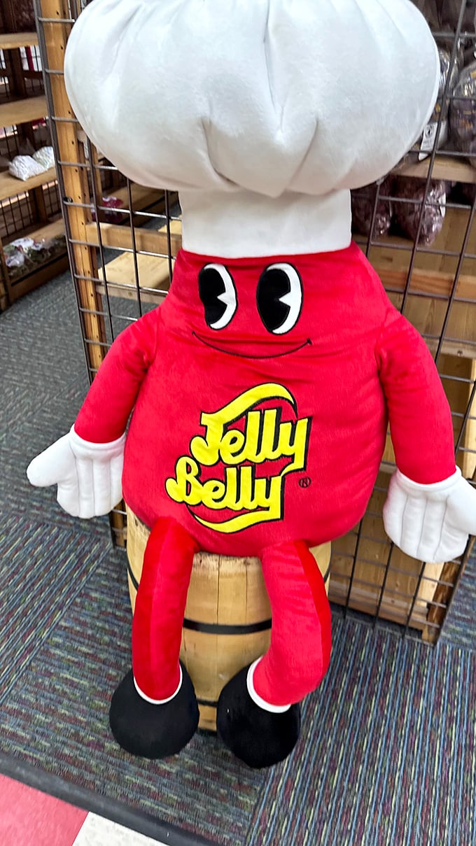 The Jelly Belly mascot stands guard, his chef's hat and cheerful demeanor hiding the fact that he's literally made of the bodies of his fallen comrades.