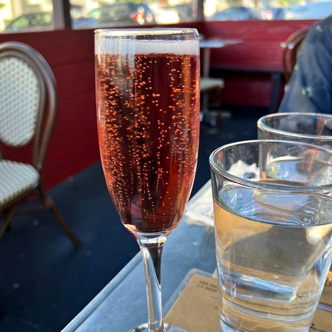 A Kir Royale that sparkles like conversation at a good dinner party—effervescent, slightly sweet, and gone too quickly.
