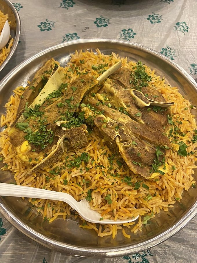 This isn't just rice with meat – it's a masterpiece of slow-cooked lamb that falls apart at the mere suggestion of your fork.