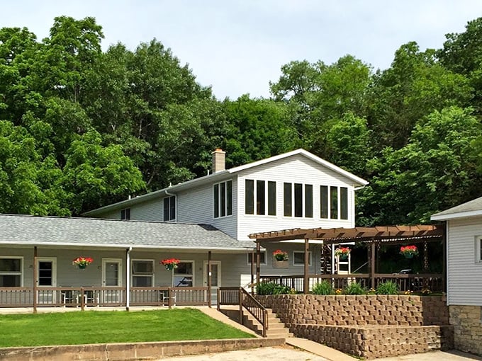 Little Bluff Inn welcomes visitors with that quintessential Wisconsin hospitality—unpretentious comfort surrounded by nature's finest landscaping work.