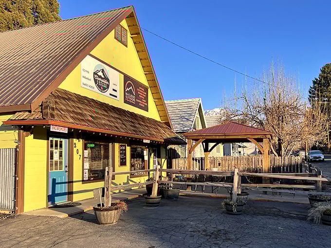 McCloud Outdoors & Gear Exchange brings a splash of sunshine yellow to Main Street, its rustic patio perfect for plotting tomorrow's mountain adventures.