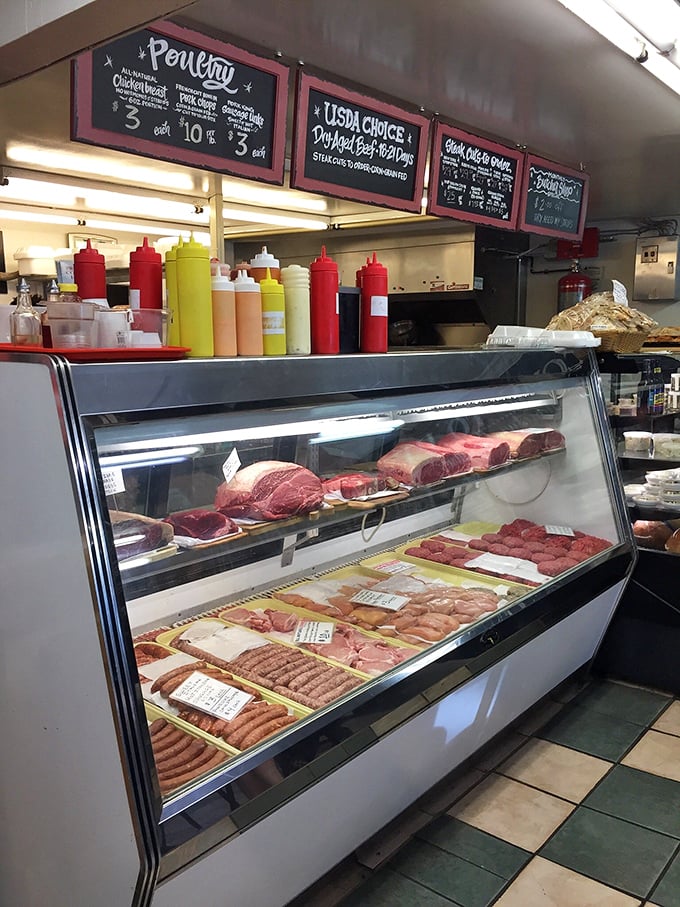 Behind glass, a butcher's pride is on full display. These aren't just cuts of meat—they're possibilities, promises, and tomorrow's dinner table triumphs.
