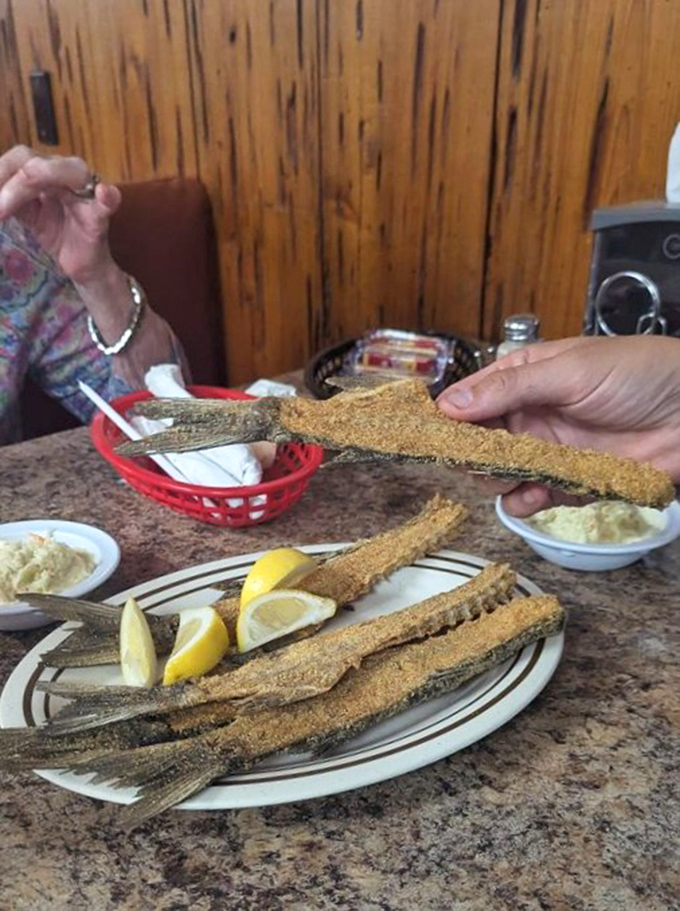 Fried mullet backbone might look intimidating to newcomers, but locals know it's Florida's answer to potato chips—only infinitely more flavorful and conversation-starting.