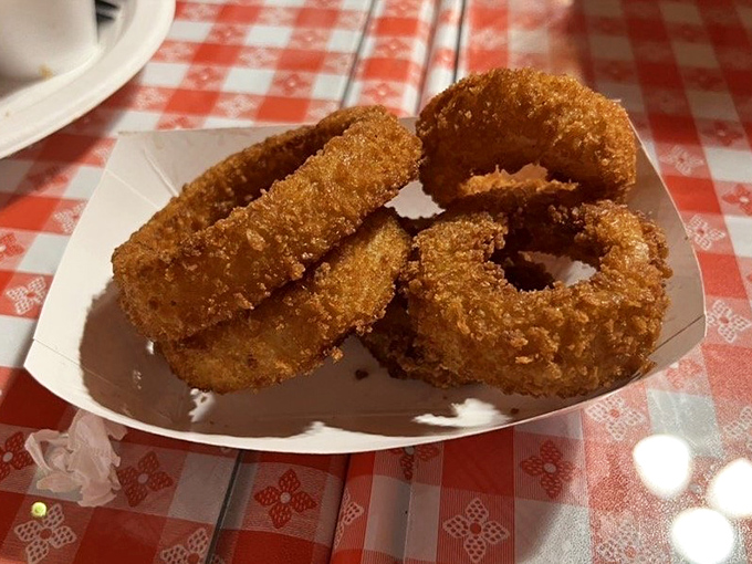 Golden-fried onion rings with a crunch so satisfying it deserves its own sound effect – the perfect sidekick to smoky main characters.