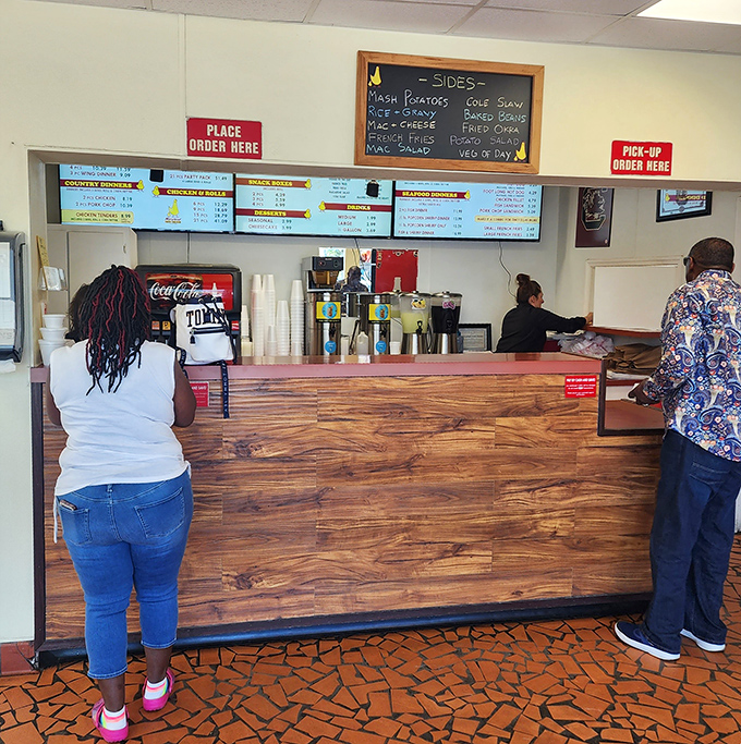 The wooden counter where magic happens—place your order here and prepare for a religious experience in fried form.