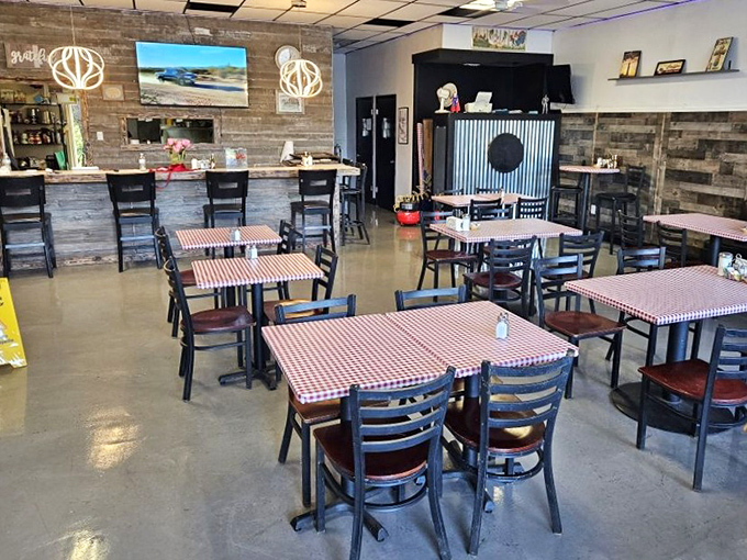 Modern touches blend with classic diner aesthetics. Those pendant lights could be in a design magazine, but they're illuminating your breakfast instead.