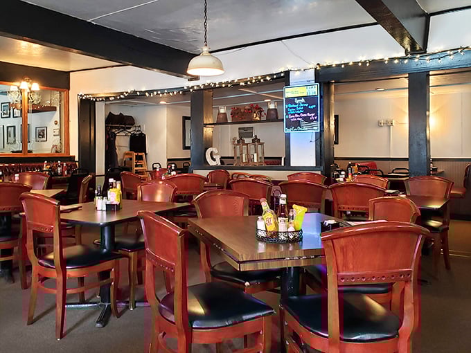 Where cheesesteak dreams come true – red chairs waiting patiently for the next round of sandwich enthusiasts.
