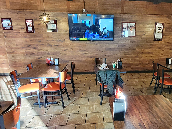 Rustic wood paneling and simple furnishings create the perfect backdrop for serious eating. No distractions—just you, your food, and pure bliss.