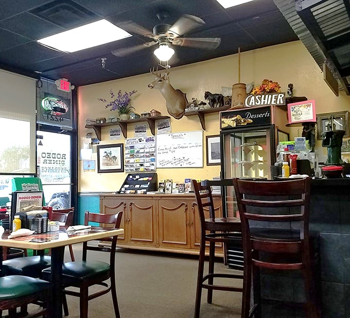 Western-themed décor meets classic diner functionality – where mounted deer heads watch over your breakfast with silent approval.