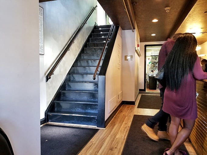 The stairway to soul food heaven isn't pearly gates—it's these simple steps leading to flavor paradise. Follow the wooden floors to fulfillment.