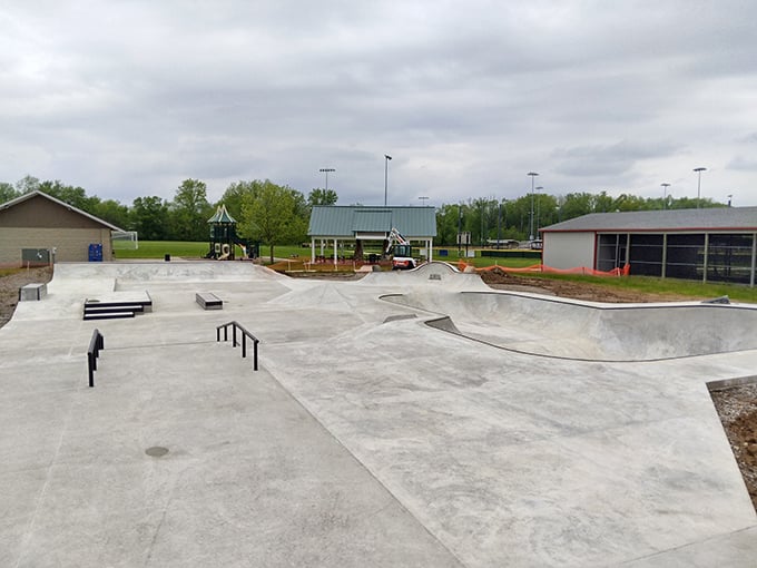 The skate park—where retirement planning and teenage recreation create an unlikely harmony. "No, I'm not learning kickflips at 65... maybe just a gentle roll."