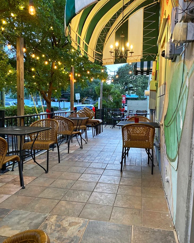 String lights transform the patio into a magical outdoor escape where calories consumed after sunset clearly don't count.