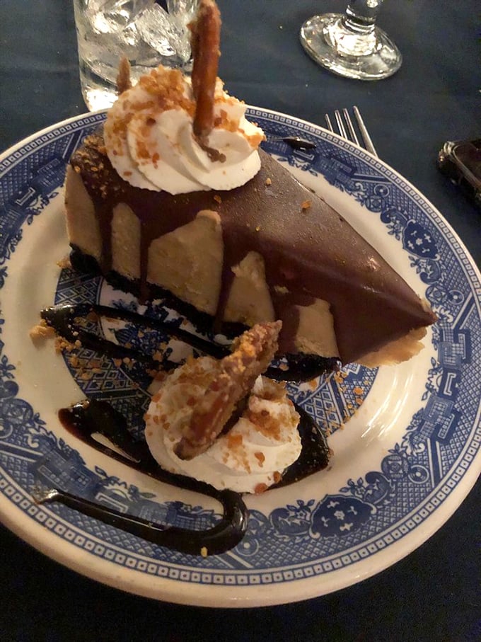This chocolate peanut butter pie doesn't just end a meal—it creates a memory. The kind that has you plotting your return before leaving.