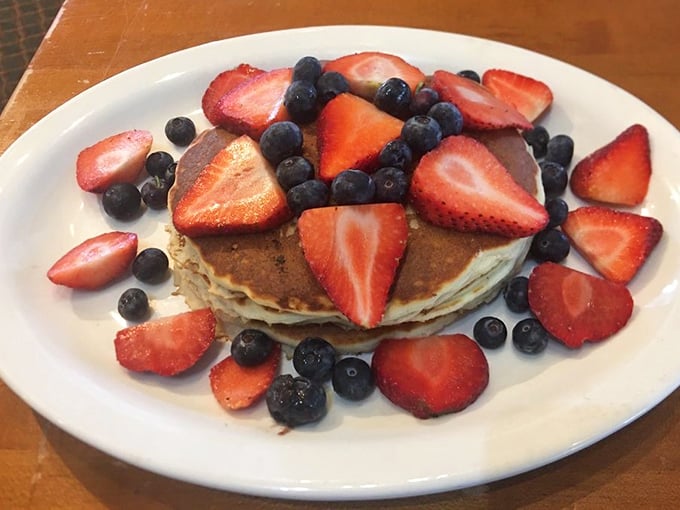 Pancakes that don't need to try too hard—just perfectly golden discs playing the perfect supporting role to nature's candy.