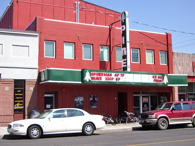 The Pine Theater's classic marquee promises entertainment the old-fashioned way—no algorithms suggesting what to watch, just community gathering for shared stories.