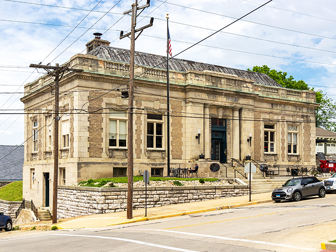 This stately limestone building has the architectural gravitas of a place where important decisions were made while wearing suspenders.