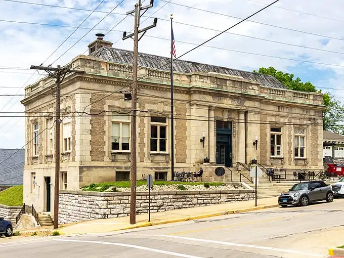 This stately limestone building has the architectural gravitas of a place where important decisions were made while wearing suspenders.