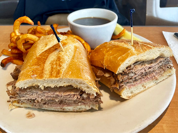 A French dip sandwich so substantial it deserves its own ZIP code. Those au jus dipping opportunities are liquid gold. 