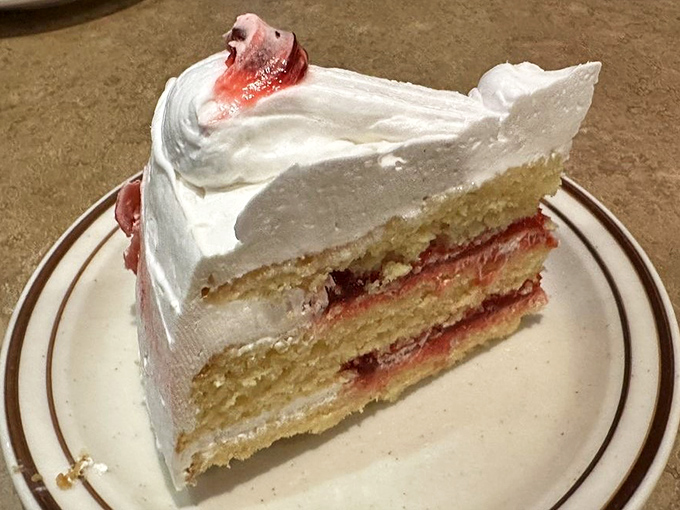 Layer cake that doesn't just satisfy your sweet tooth—it throws a party for it. Each forkful is a tiny celebration.