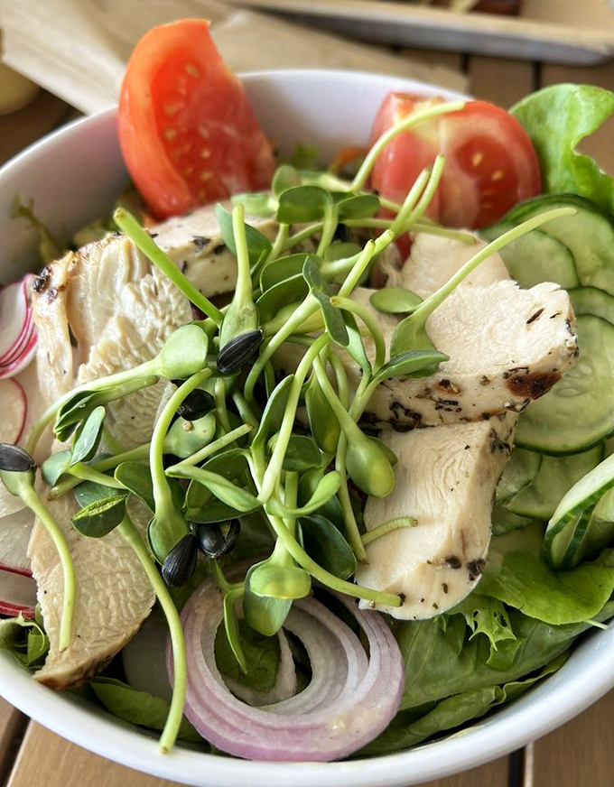 A salad that actually excites—where microgreens and grilled chicken have the kind of relationship nutritionists dream about.
