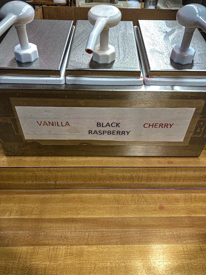 Three humble dispensers offering flavor journeys more exciting than most vacation destinations.