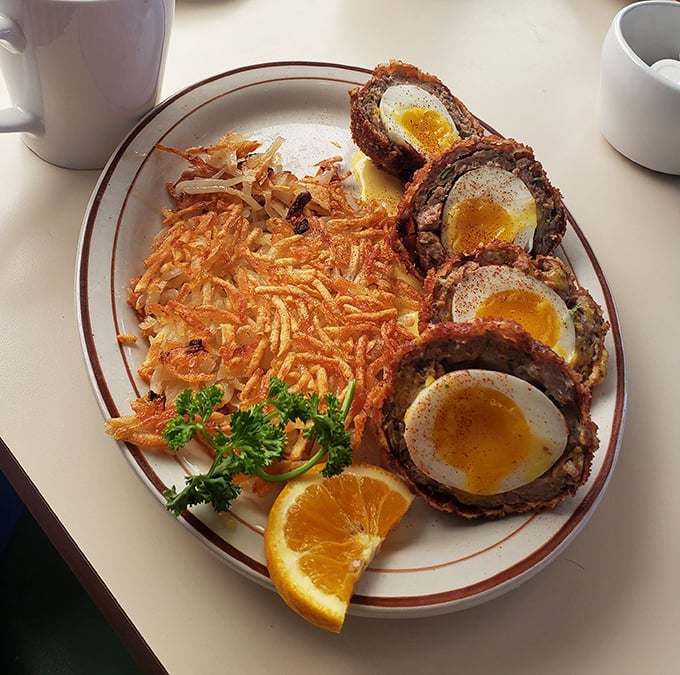 Scotch eggs that would make a Highlander weep with joy—crispy exterior giving way to savory sausage and perfect yolk.