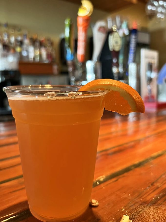 A cold one with a view—this Shock Top is what vacation looks like in liquid form. The orange slice isn't garnish; it's an exclamation point.