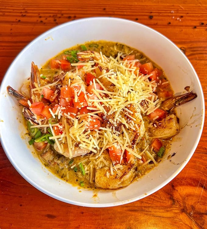 Shrimp and grits that would make a Southerner weep with joy – creamy, cheesy, and topped with enough shrimp to make you feel downright spoiled.