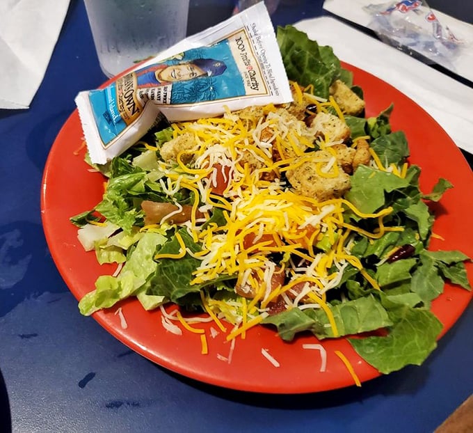 A salad that doesn't apologize for being a salad, brightened with cheese and grilled protein—the kind that makes you forget you're eating healthy.
