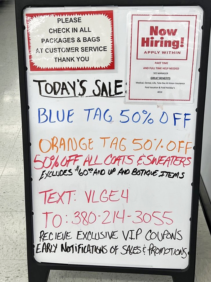The color-coded tag system is the secret language of serious thrifters – blue and orange tags at 50% off means double the treasures today!