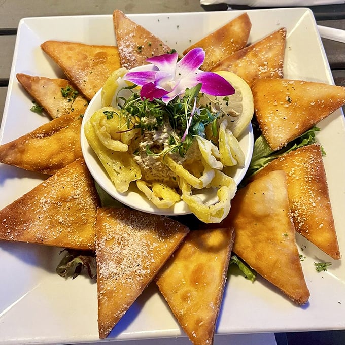 The smoked tuna dip surrounded by golden triangles of toast isn't just an appetizer—it's the beginning of a beautiful friendship between your taste buds and the Gulf.