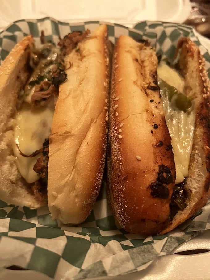 Seeded roll, glistening meat, melted cheese—a trifecta of deliciousness. This sandwich doesn't just feed you; it hugs your soul.