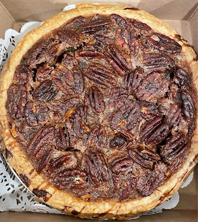 This pecan pie isn't just dessert—it's a sweet, nutty sermon on the virtues of butter, sugar, and patience. Resistance is futile.