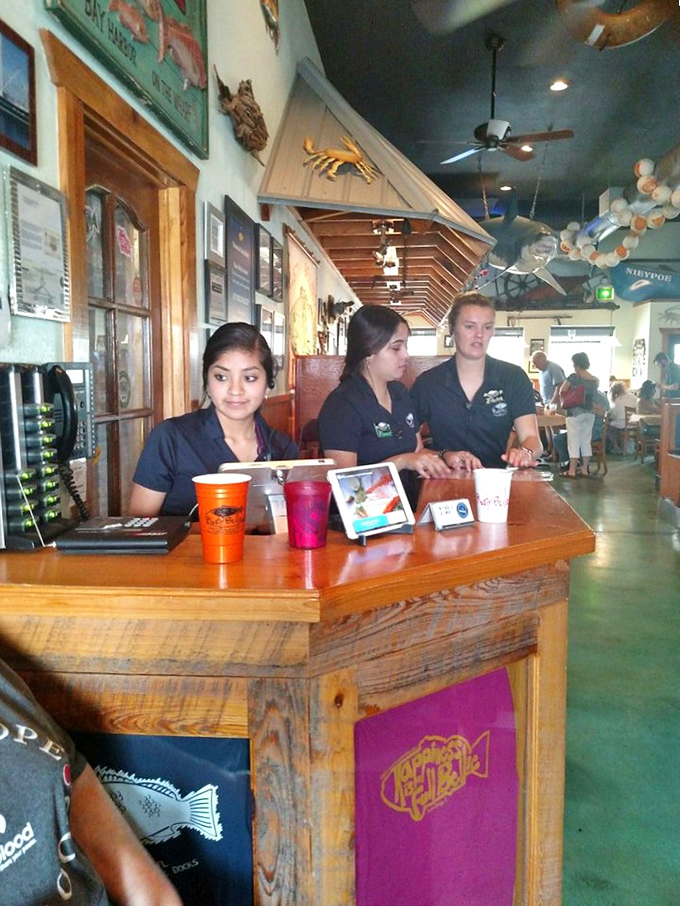 The staff doesn't just serve seafood—they're seafood ambassadors, guiding you through the day's catch with the expertise of maritime scholars.