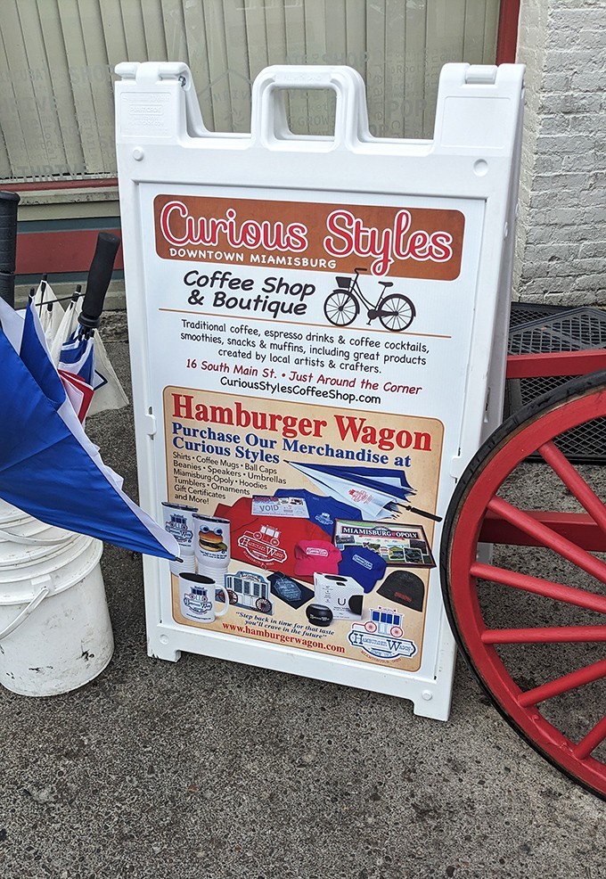 Local businesses supporting each other—the true heartbeat of small-town America. That sign knows where the good stuff is.