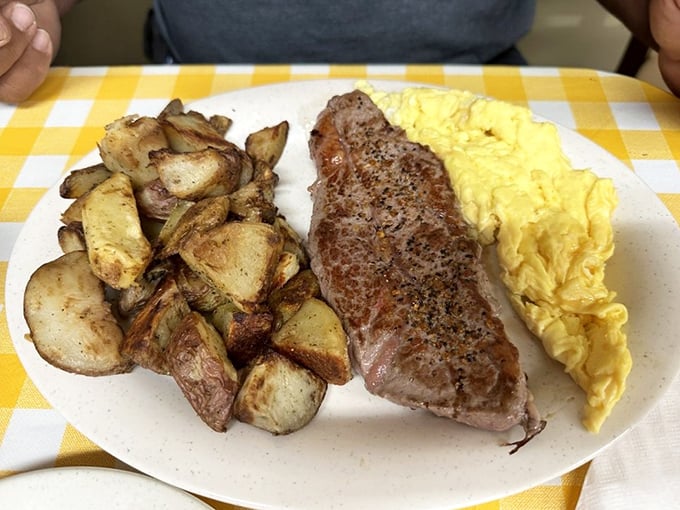 Steak and eggs – the breakfast of champions, lumberjacks, and anyone who plans to skip lunch. Those potatoes are the unsung heroes of the plate.